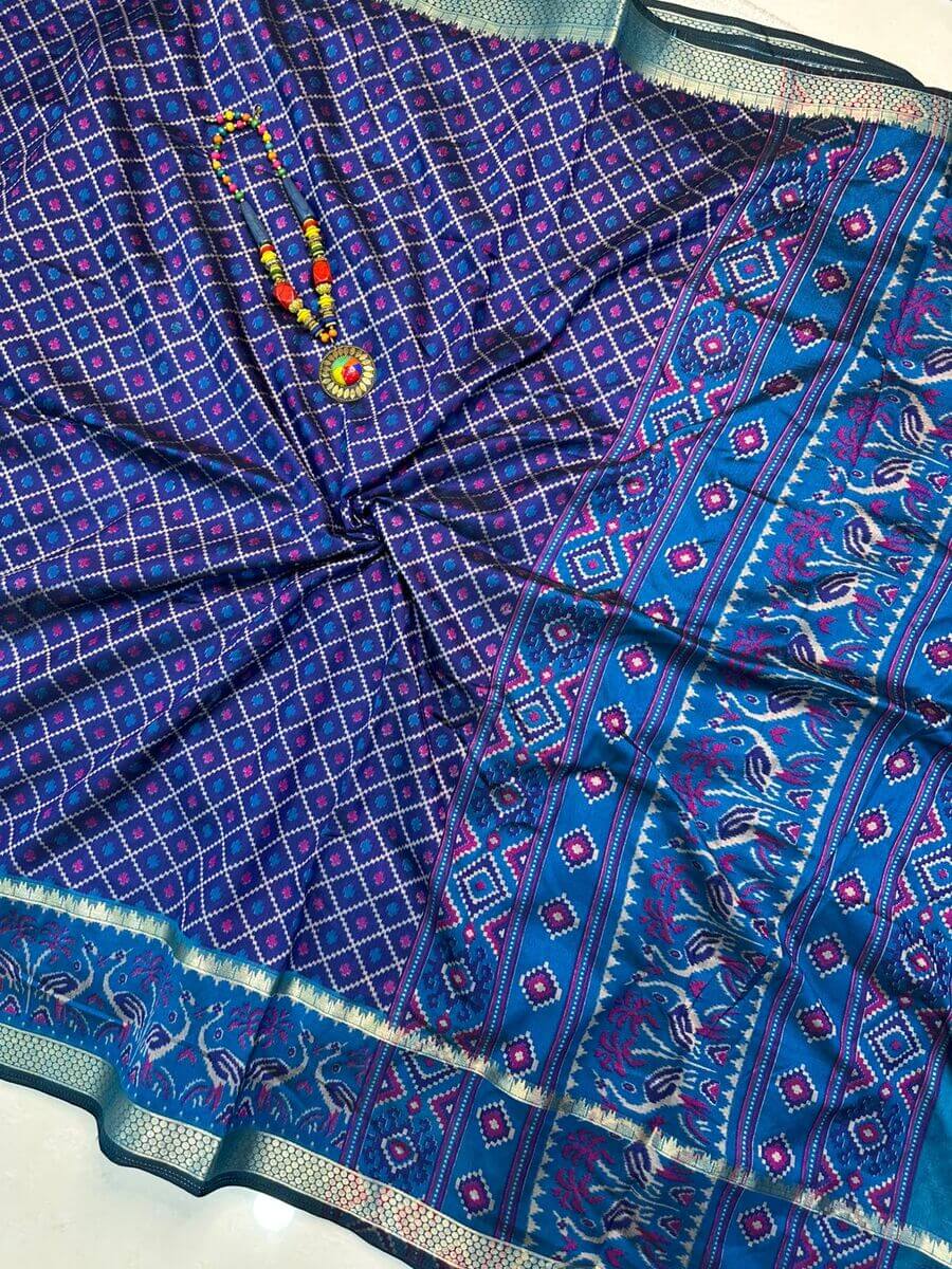 Ravishing Navy Blue Soft Printed Patola Silk Saree with Capricious Blo ...